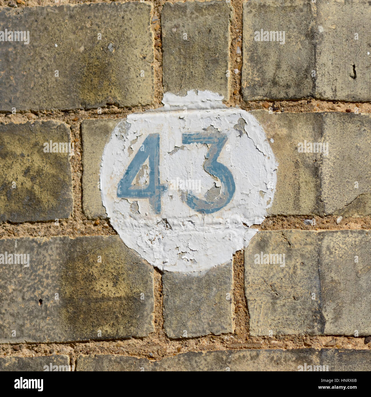 House number 43 sign on wall Stock Photo - Alamy