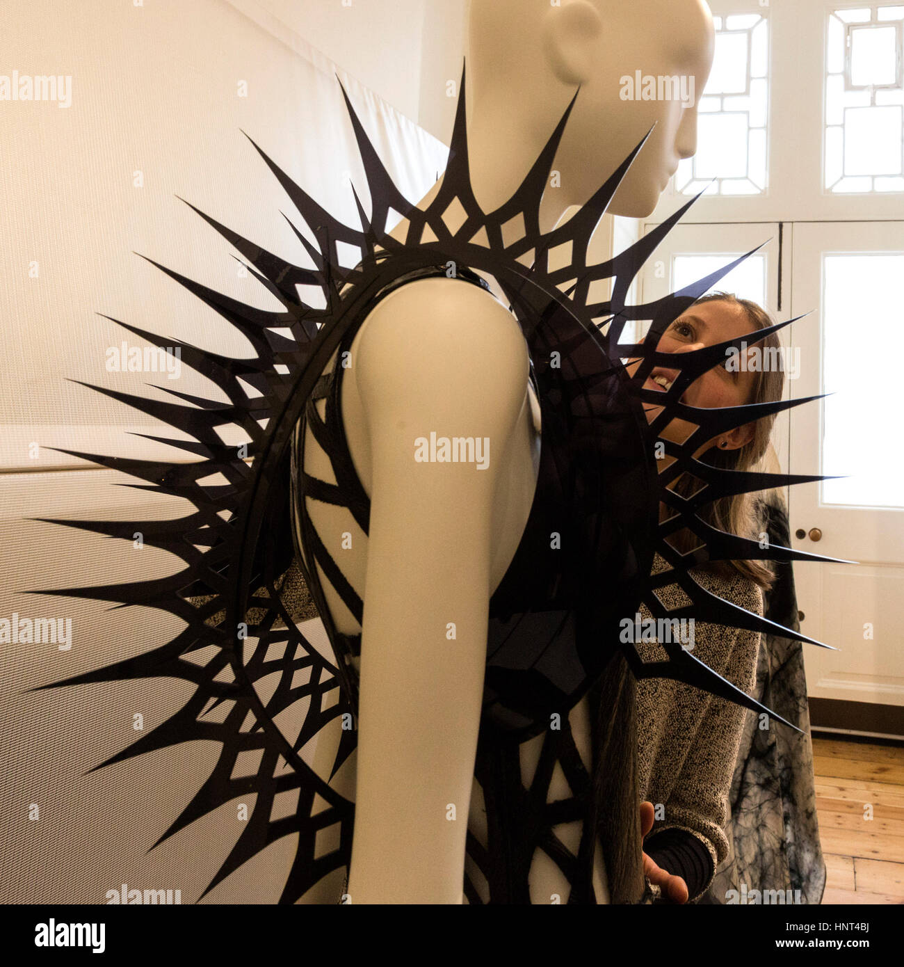 London, UK. 16th Feb, 2017. Exhibition assistant Monique Ricketts takes ...