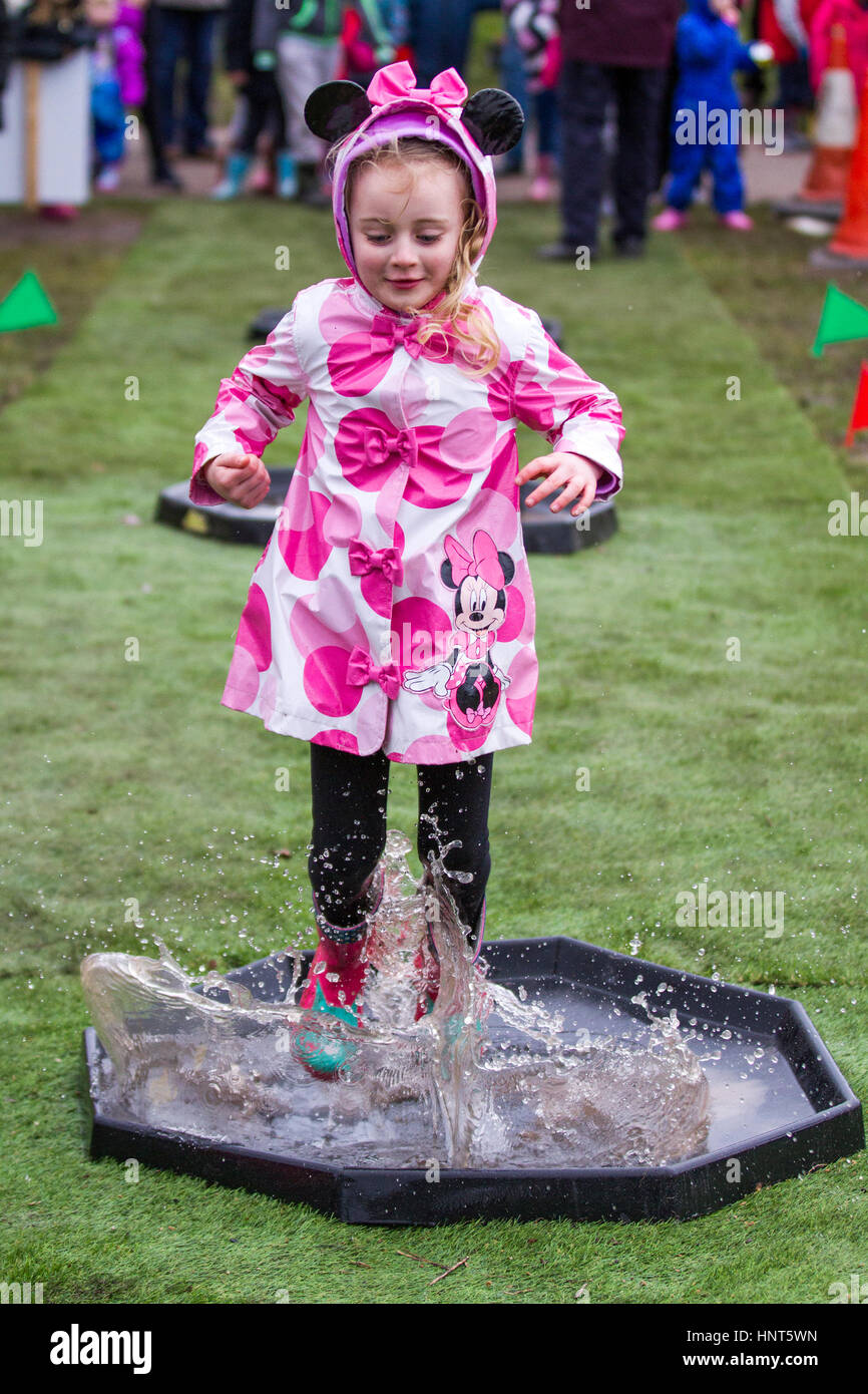 Kids splashing puddles hi-res stock photography and images - Alamy