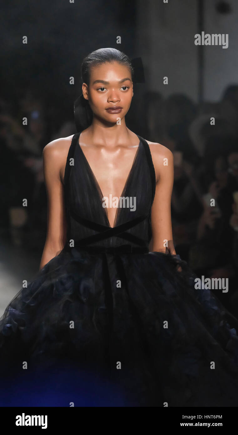 New York, USA. 15th Feb, 2017. A model walks runway for the Marchesa ...