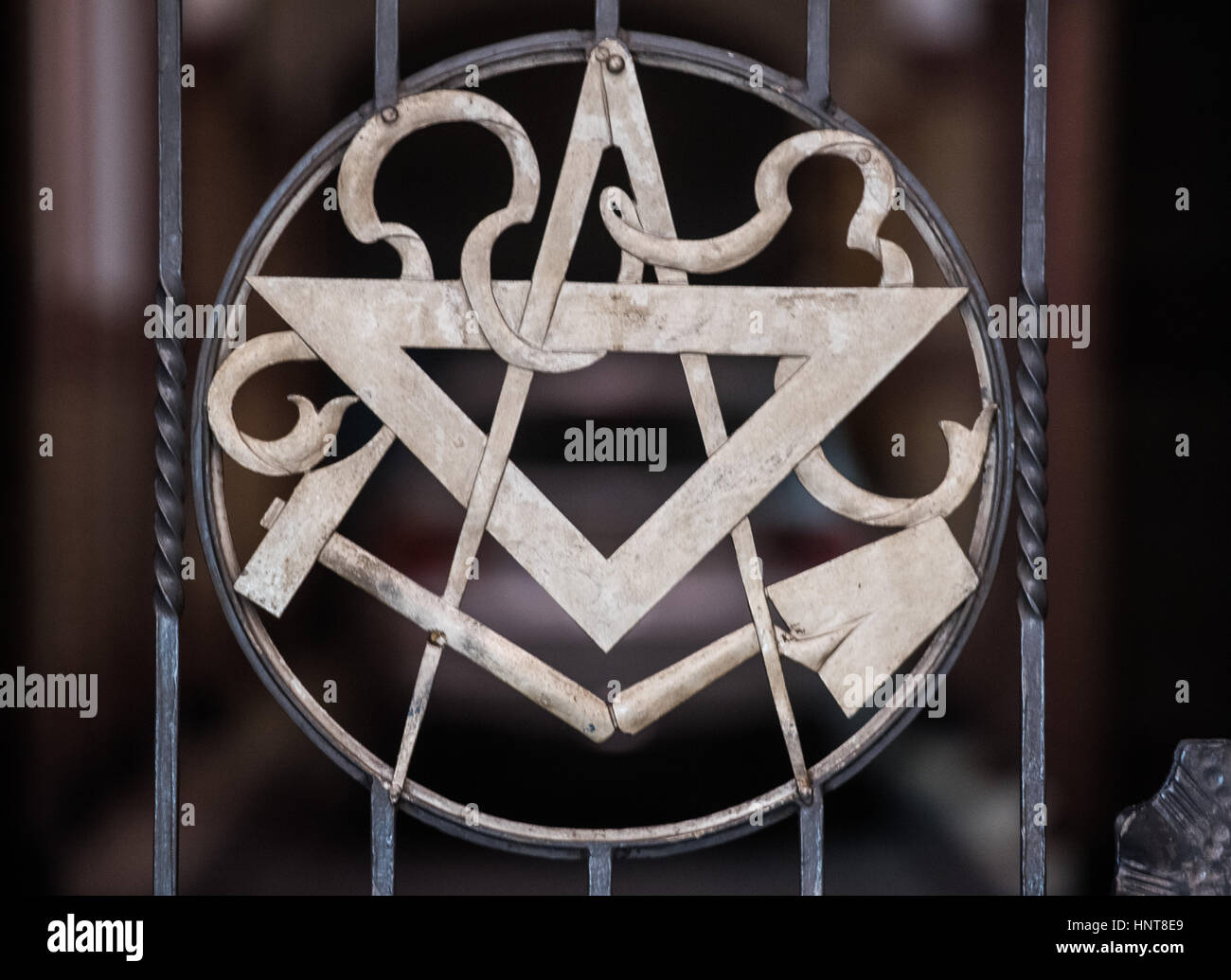 The symbols of the Masons can be seen on a gate of the lodge in ...