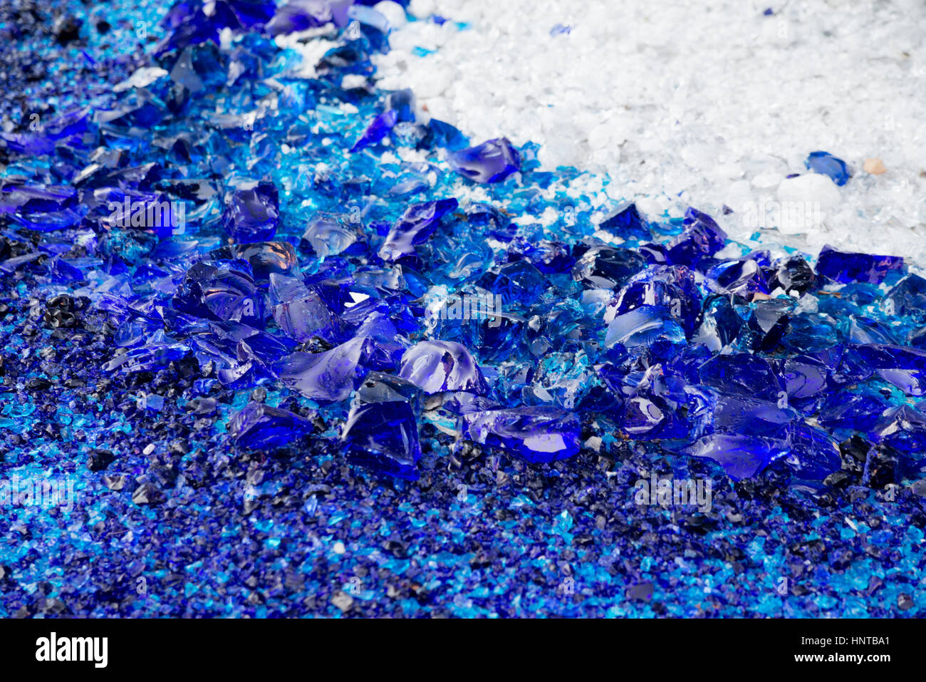 Shards of glass bottles green, scattered on the white surface Stock ...
