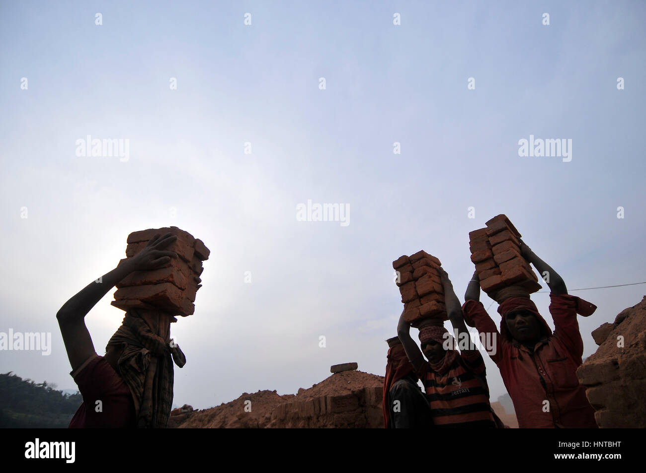 Brick Factory Worker Stacks Bricks High Resolution Stock Photography ...