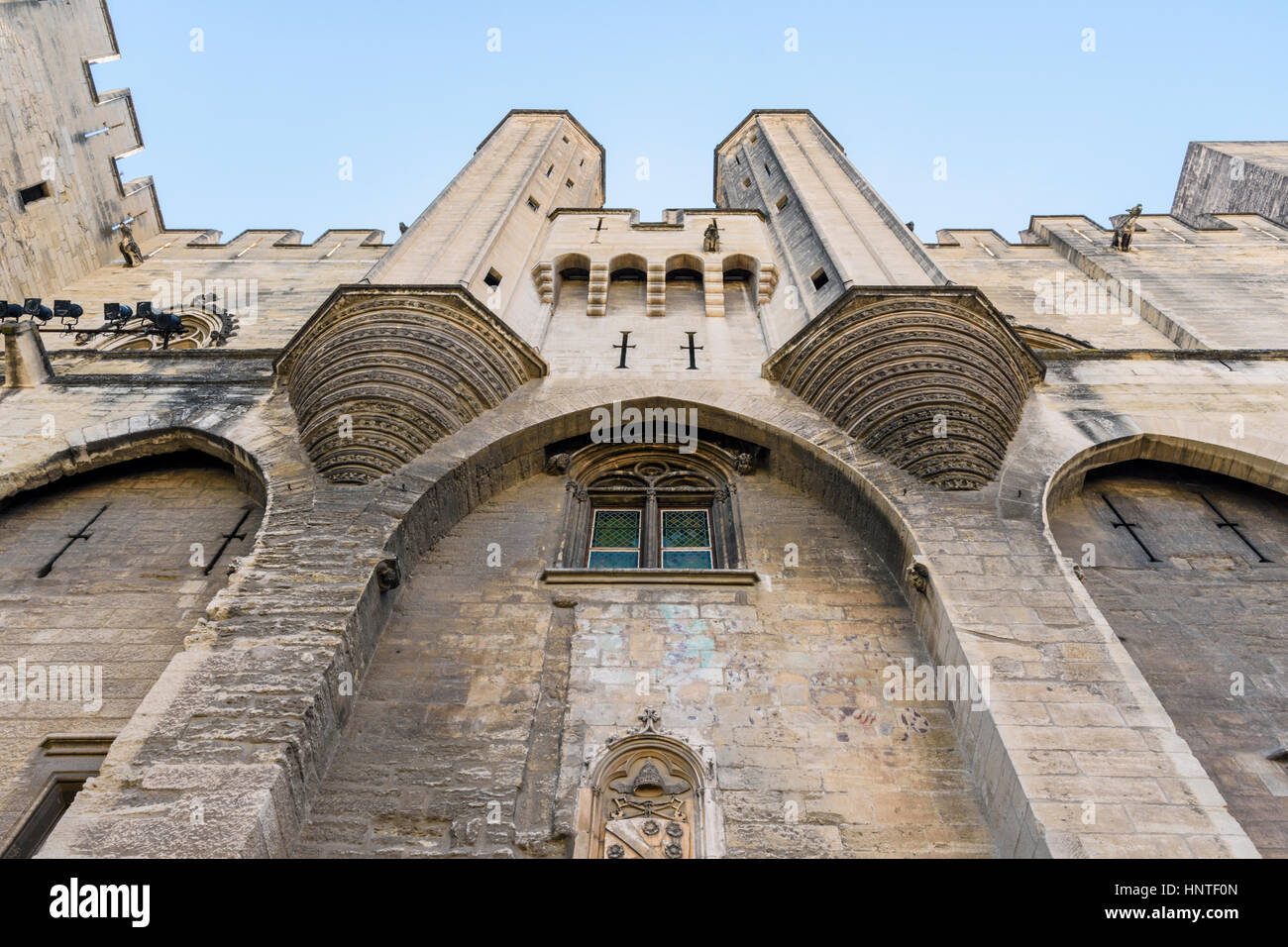 Low angle view of the imposing Gothic twin towered facade of the Palais ...