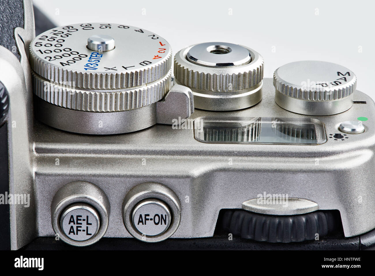 Operating elements: buttons and control dial on SLR camera closeup ...