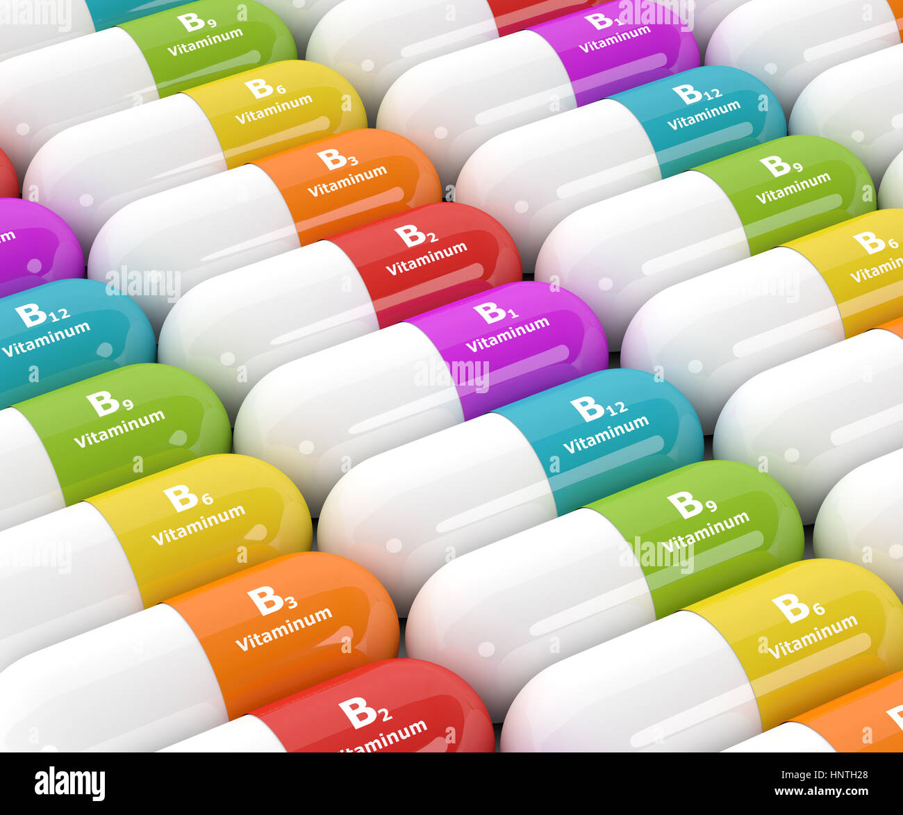 3d rendering of group B vitamin pills in rows Stock Photo - Alamy