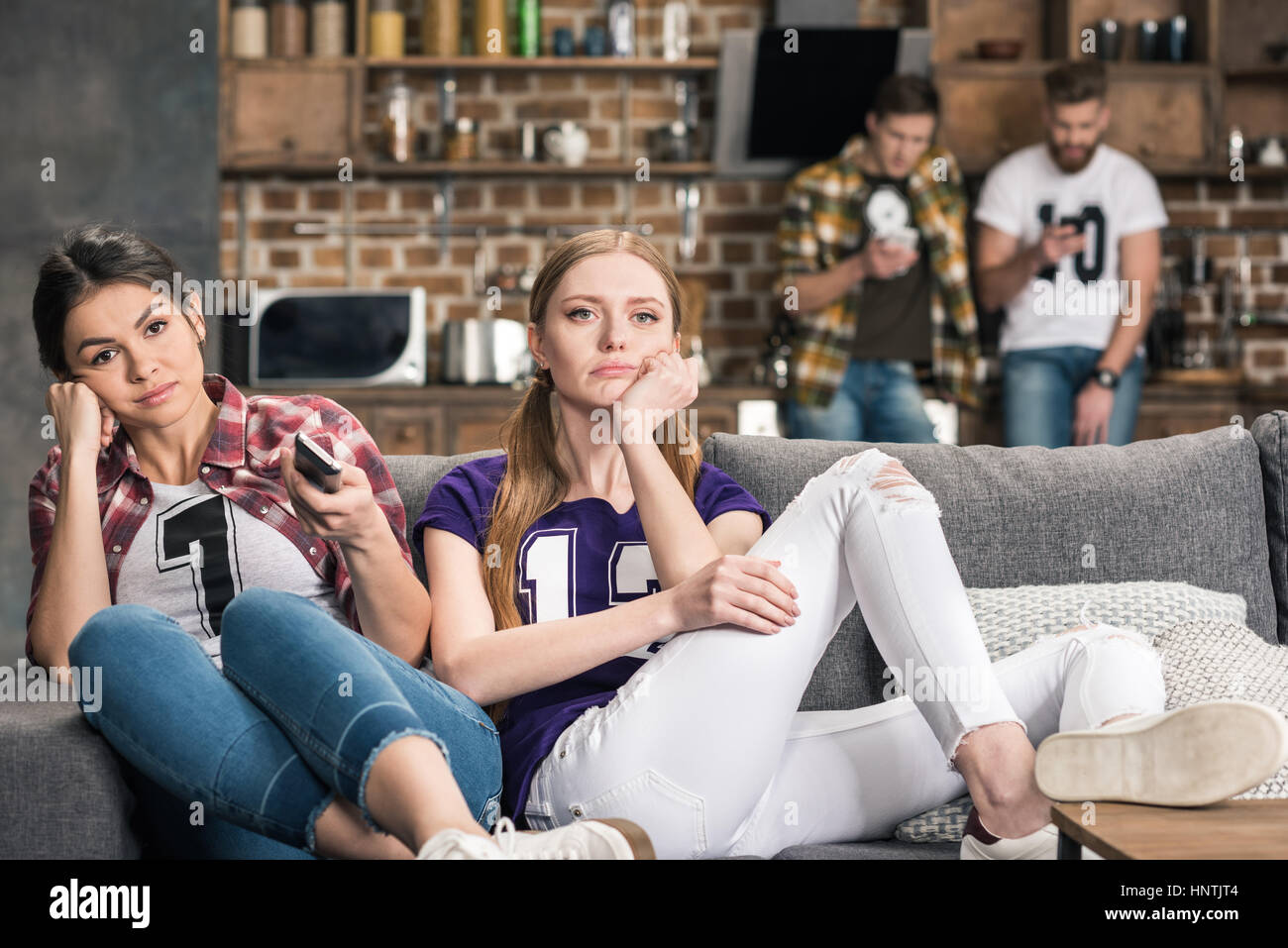 Two women upset inside hi-res stock photography and images - Alamy