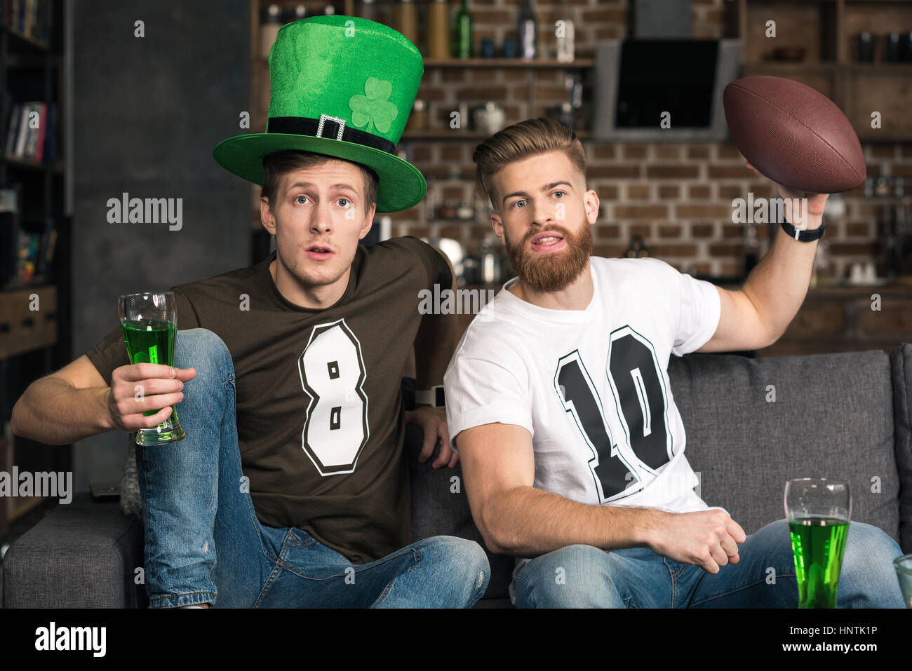men watching football match Stock Photo - Alamy