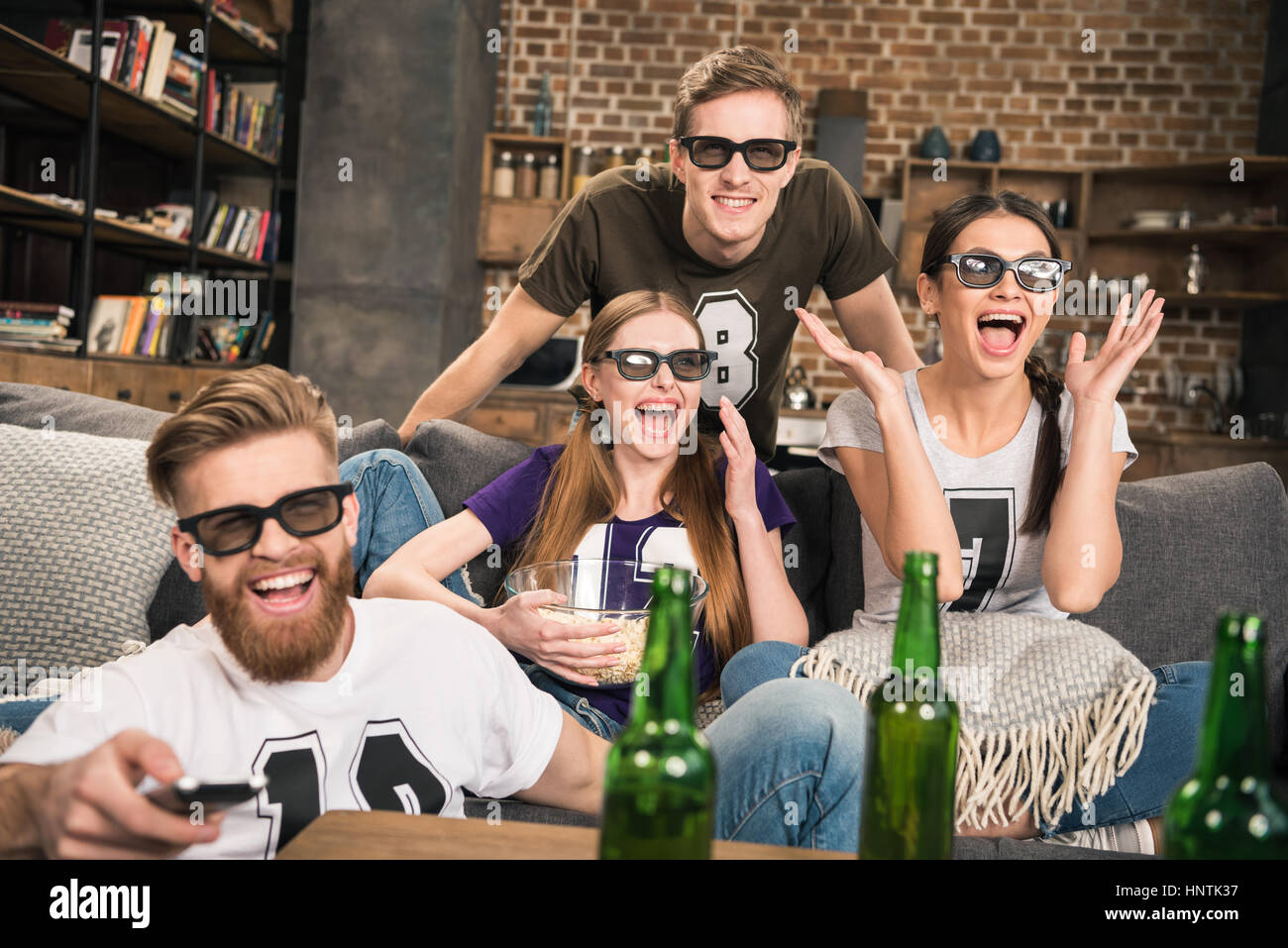 friends in 3D glasses watching movie Stock Photo - Alamy