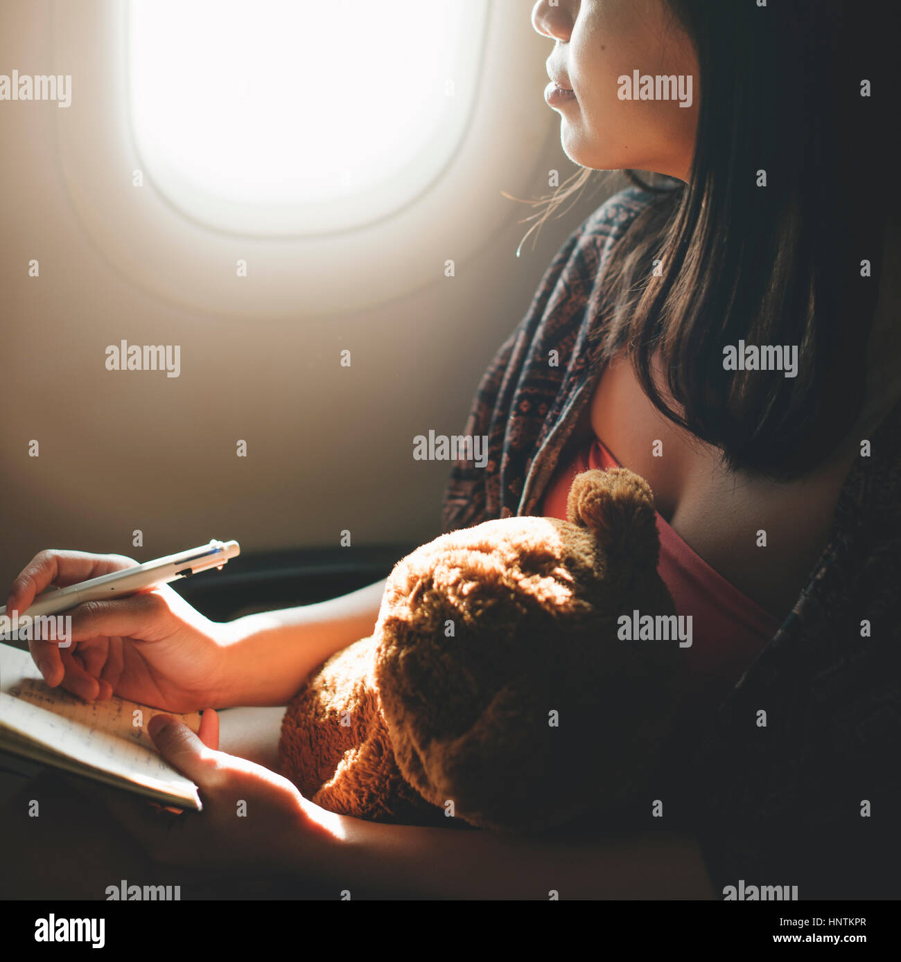 Woman Writing Diary Plane Flying Concept Stock Photo - Alamy