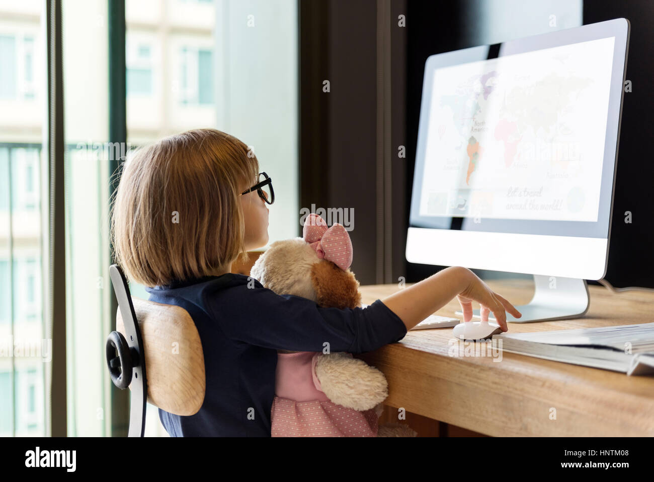 Little Girl Using Computer Concept Stock Photo - Alamy