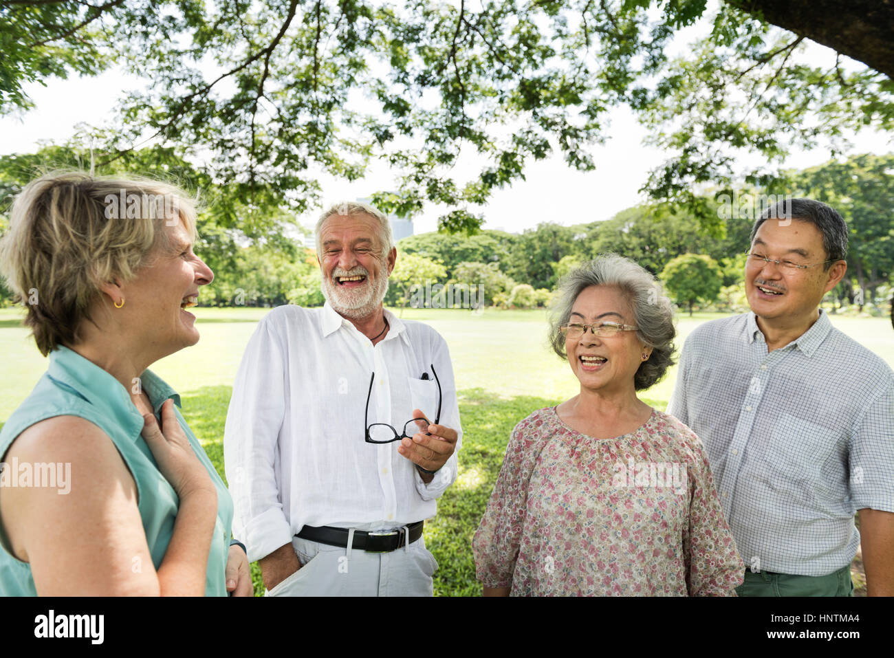 Diverse senior friends laughing hi-res stock photography and images - Alamy
