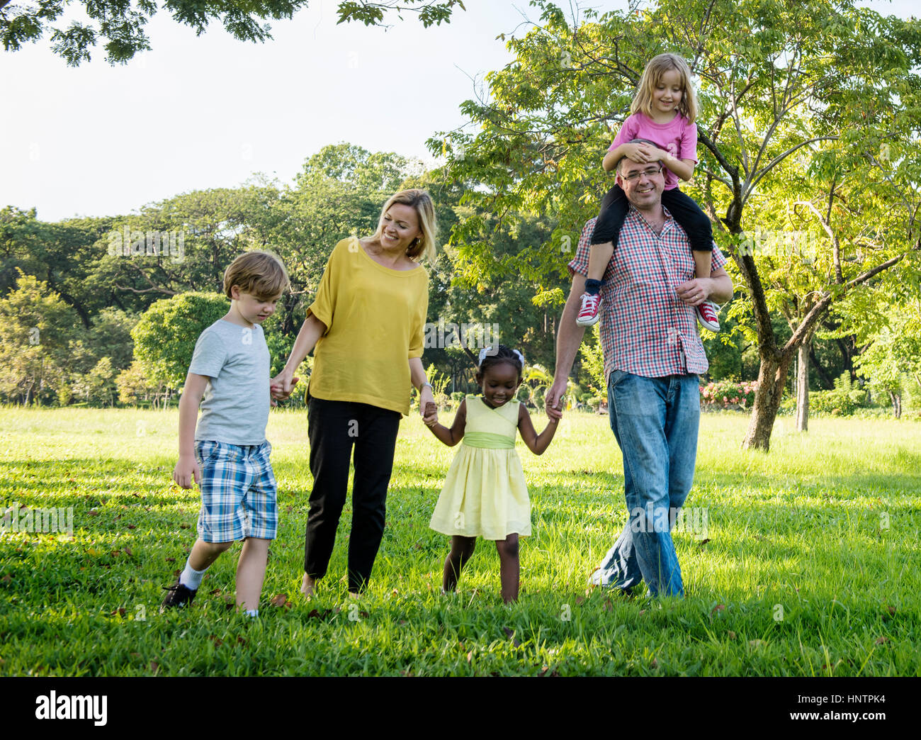 Family Walking Field Nature Togetherness Stock Photo - Alamy
