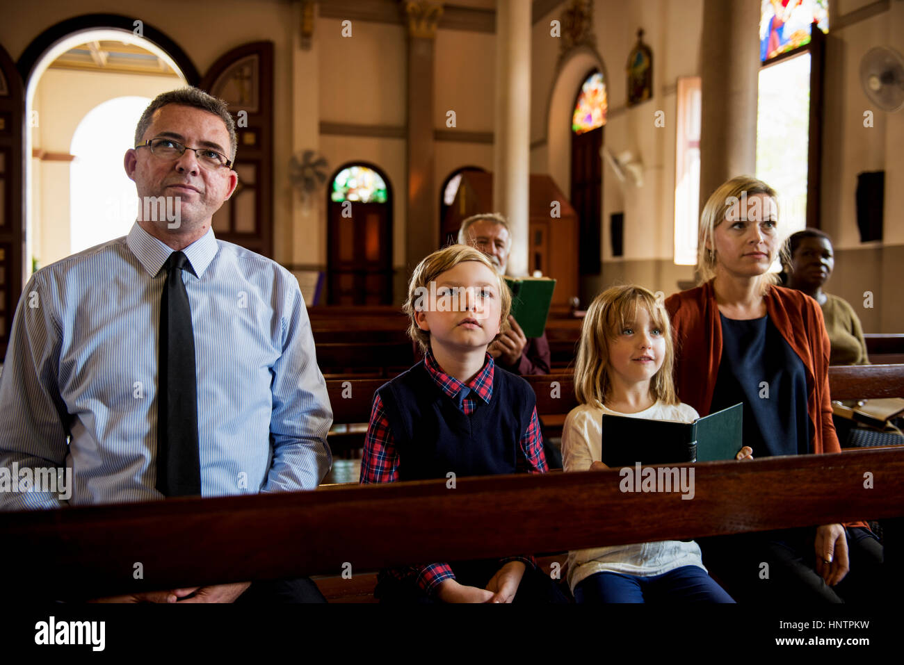 Catholic church children pew hi-res stock photography and images - Alamy