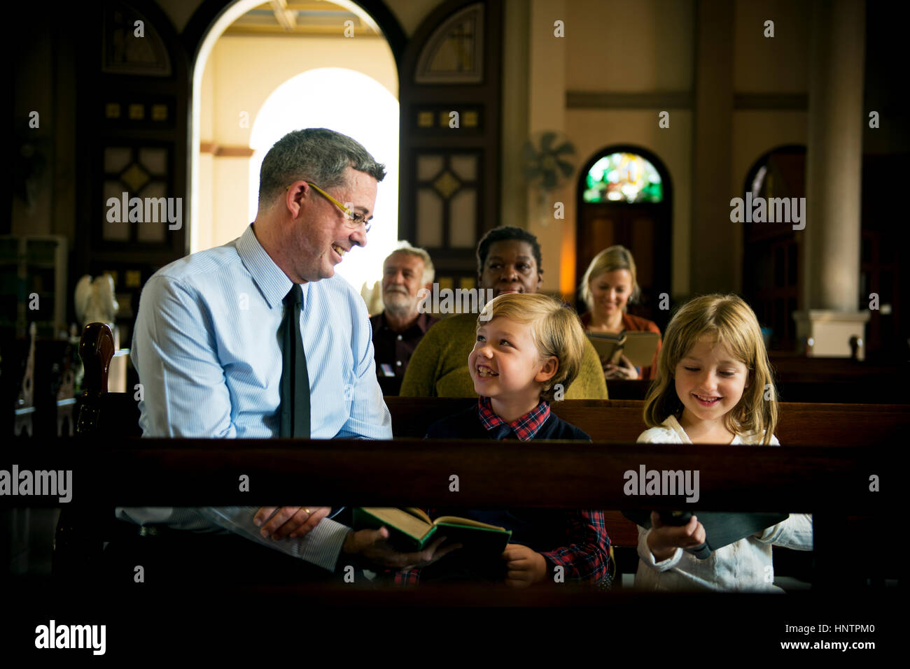 Catholic church children pew hi-res stock photography and images - Alamy