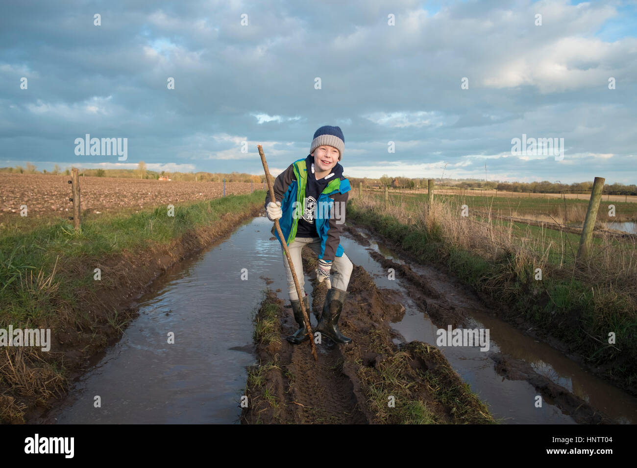 A boy walking in the English countryside Stock Photo - Alamy