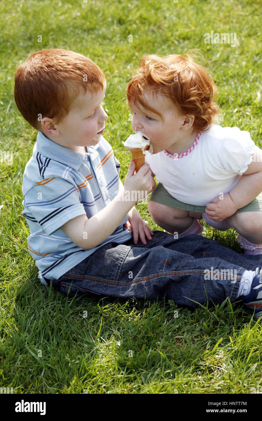 Kids Sharing Ice Cream