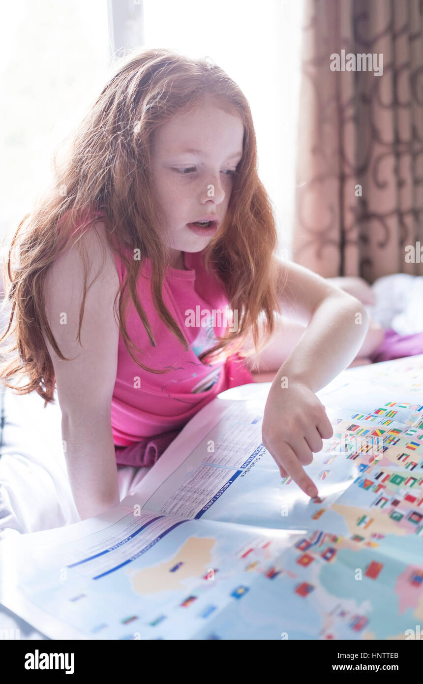 Child looking at map hi-res stock photography and images - Alamy