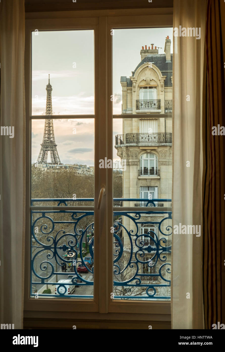 The Eiffel Tower, Paris, France, through an apartment window Stock ...