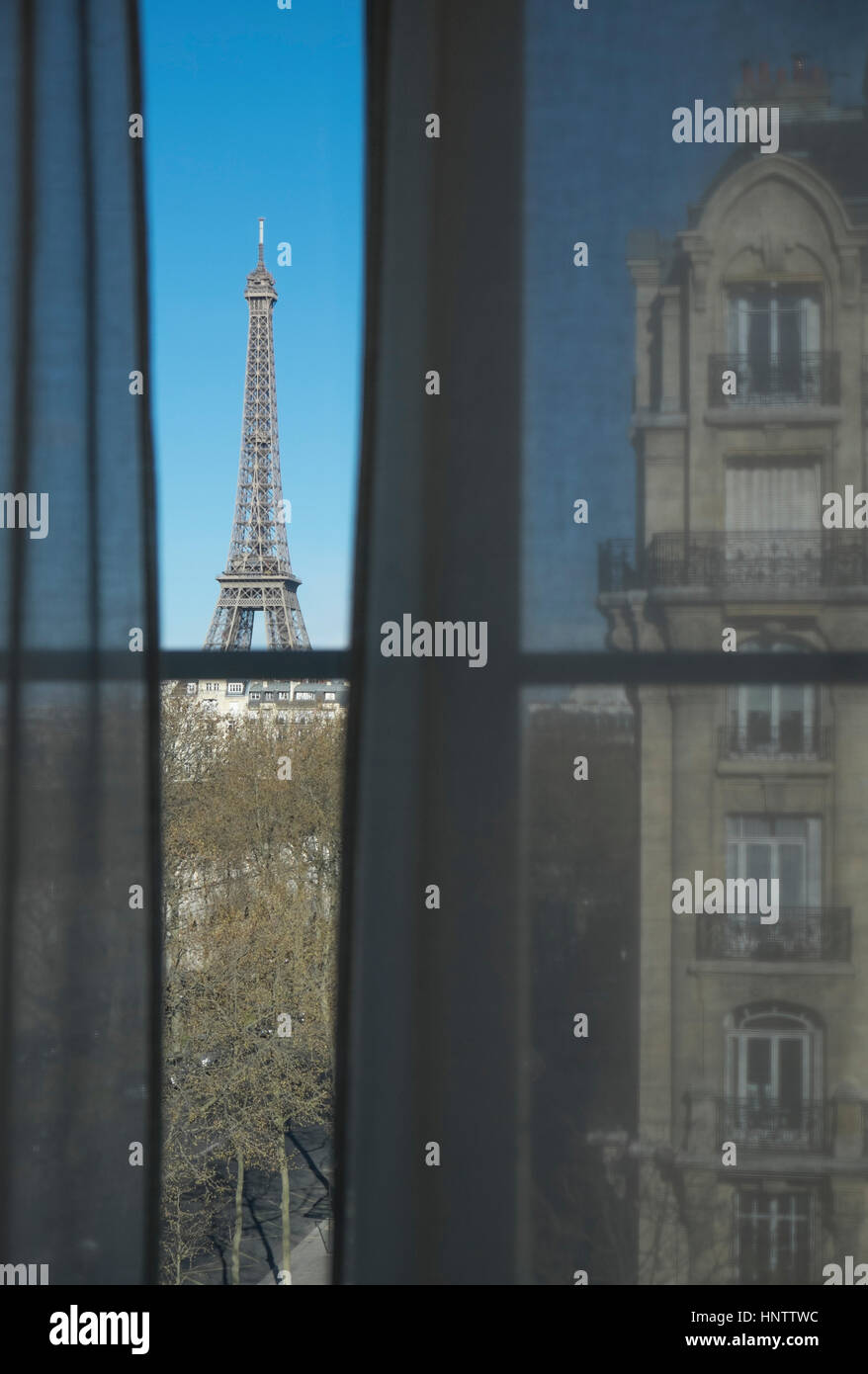Eiffel tower through window hi-res stock photography and images - Alamy