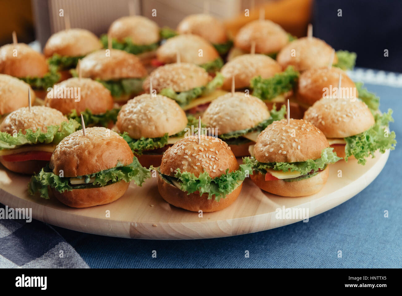 Hamburger on wood table. Home made burger. Fastfood meal Stock Photo ...
