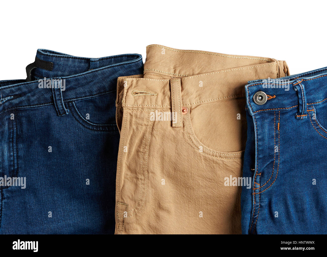 Three pair of colorful jeans isolated on white background Stock Photo ...