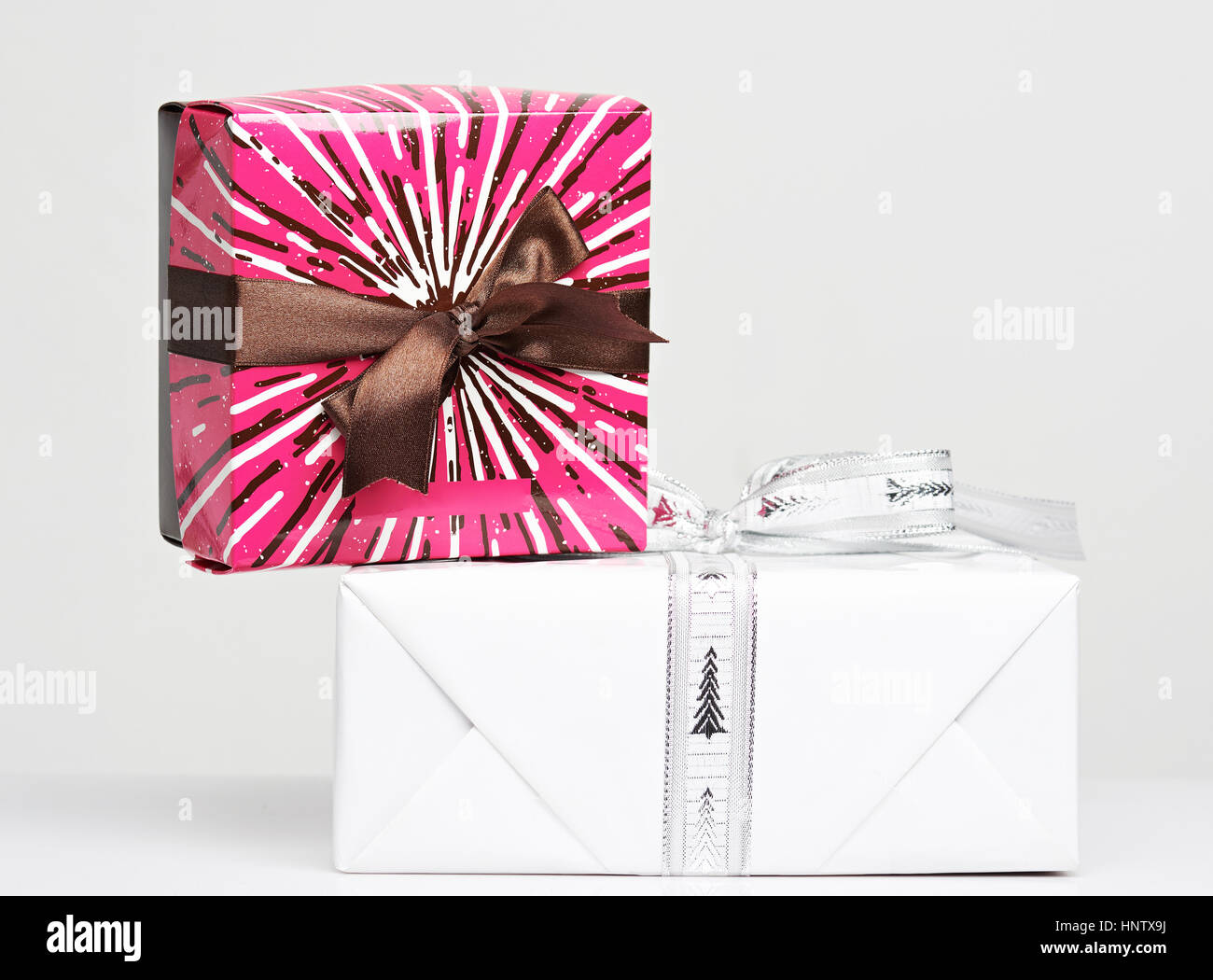 two colorful gift boxes on top of each other isolated on white Stock ...