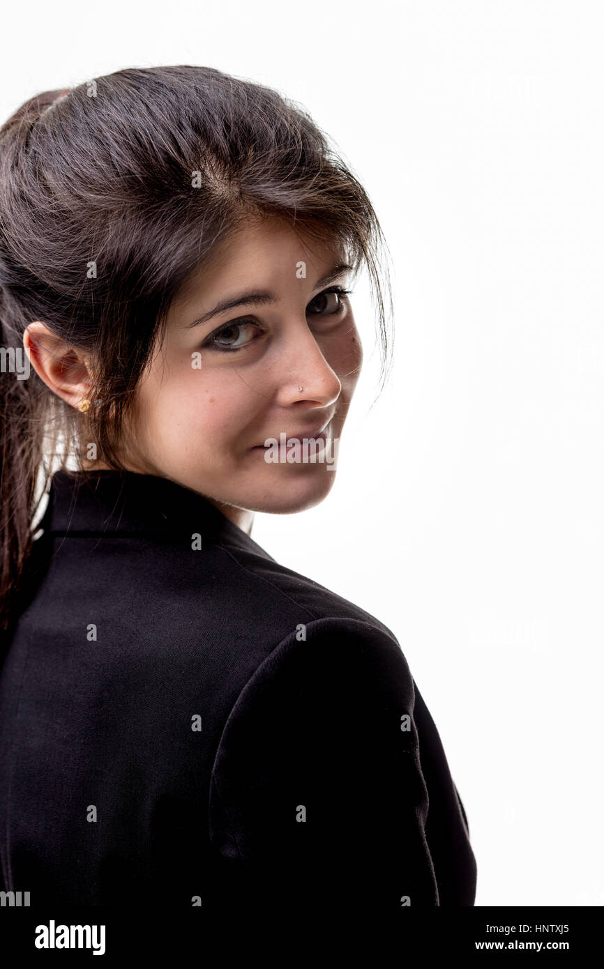 smiling pretty woman portrait looking back on a white background Stock ...