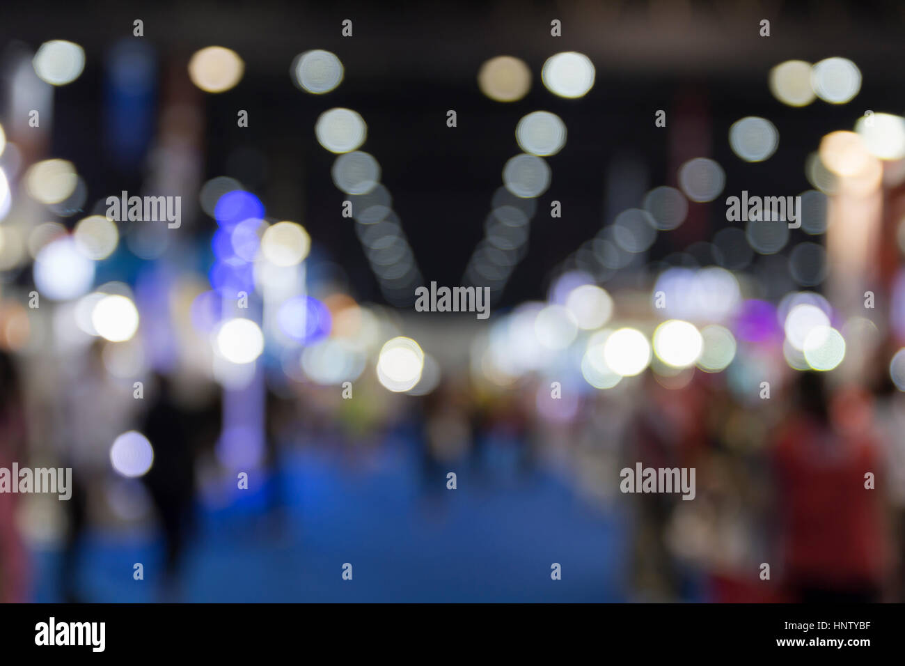 people in tradeshow exhibition hall building, blur background Stock ...