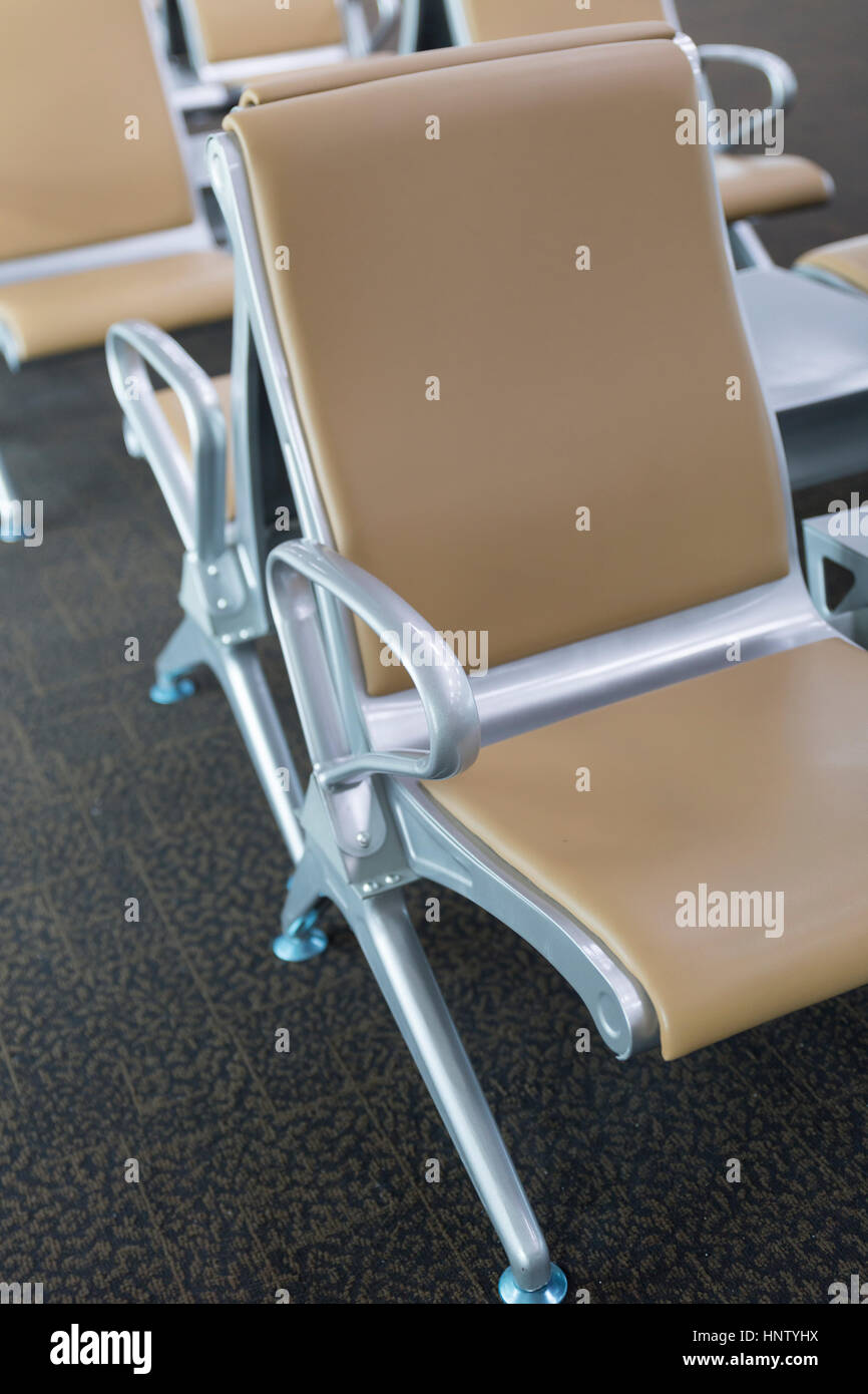 brown leather chair in airport terminal building Stock Photo - Alamy