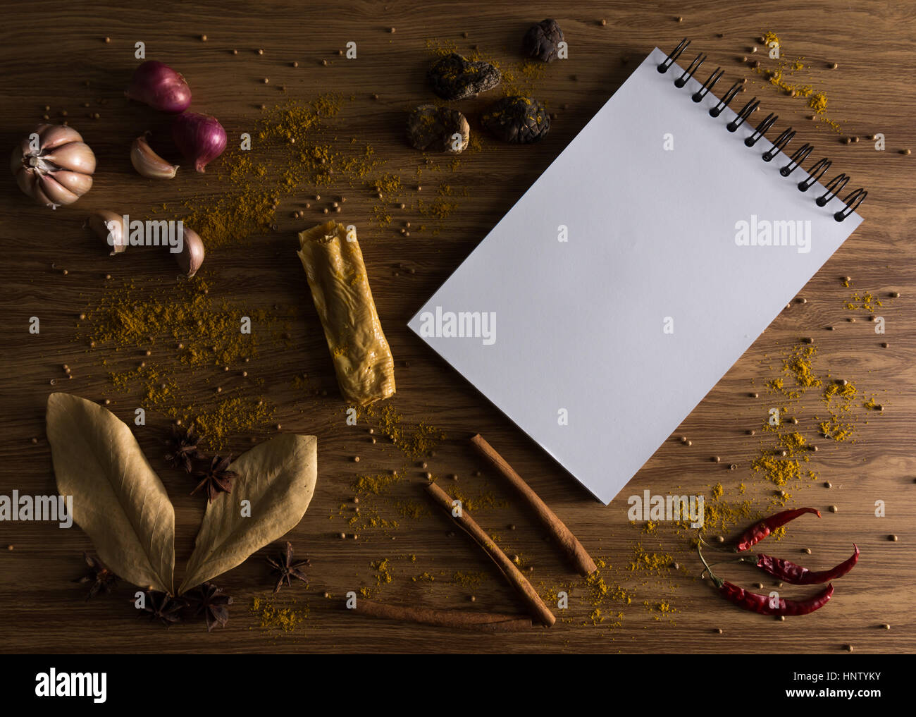 Herb and note book Stock Photo - Alamy