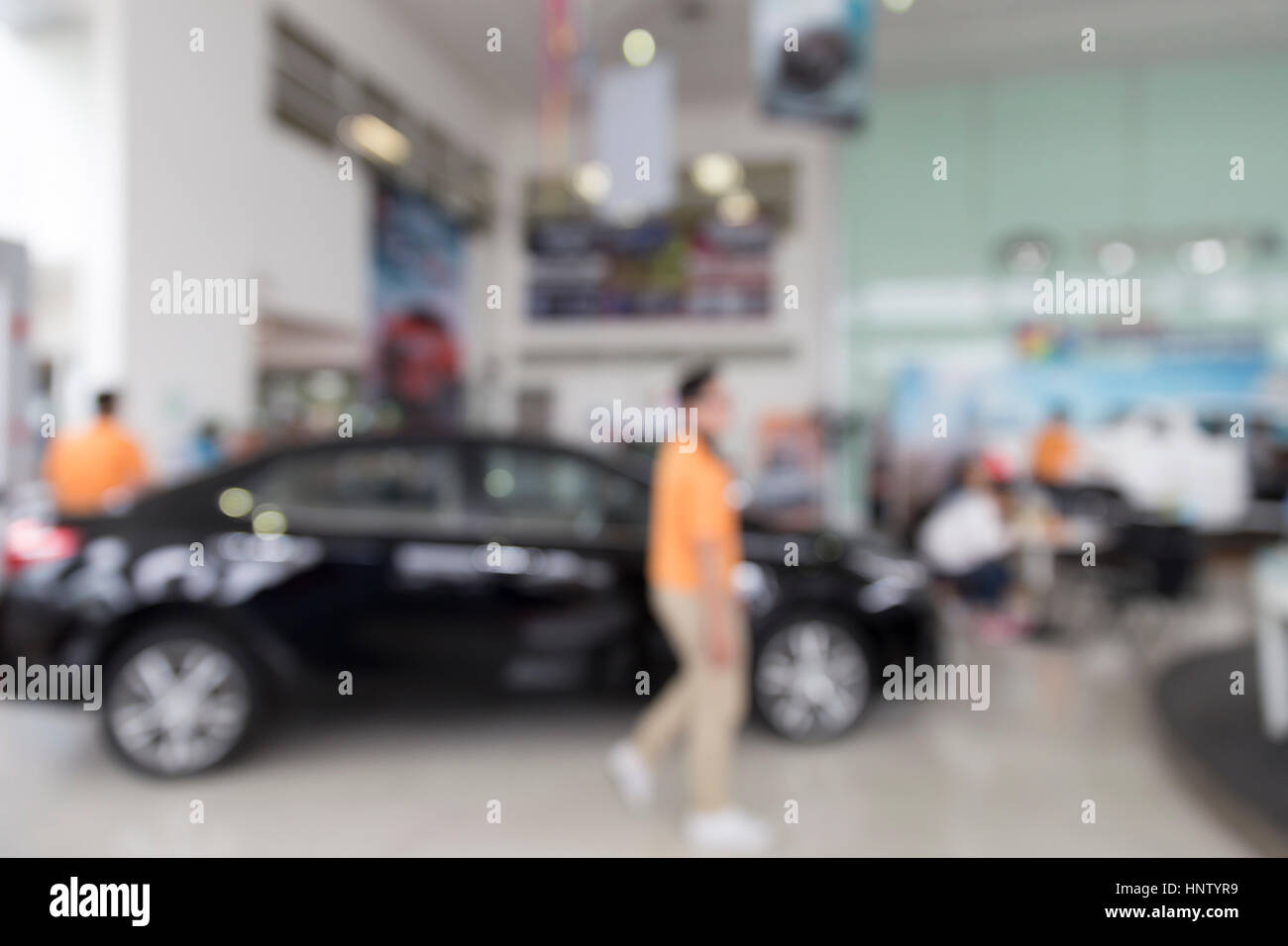 people in car showroom for buyring and selling car business concept ...