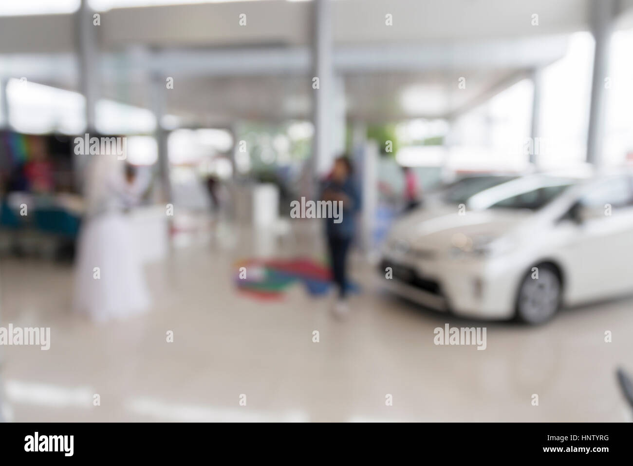 people in car showroom for buyring and selling car business concept ...