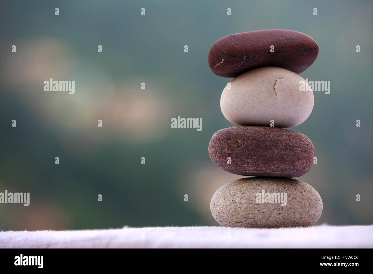 Rock balancing, ffur roundish - round edged river stones of different ...