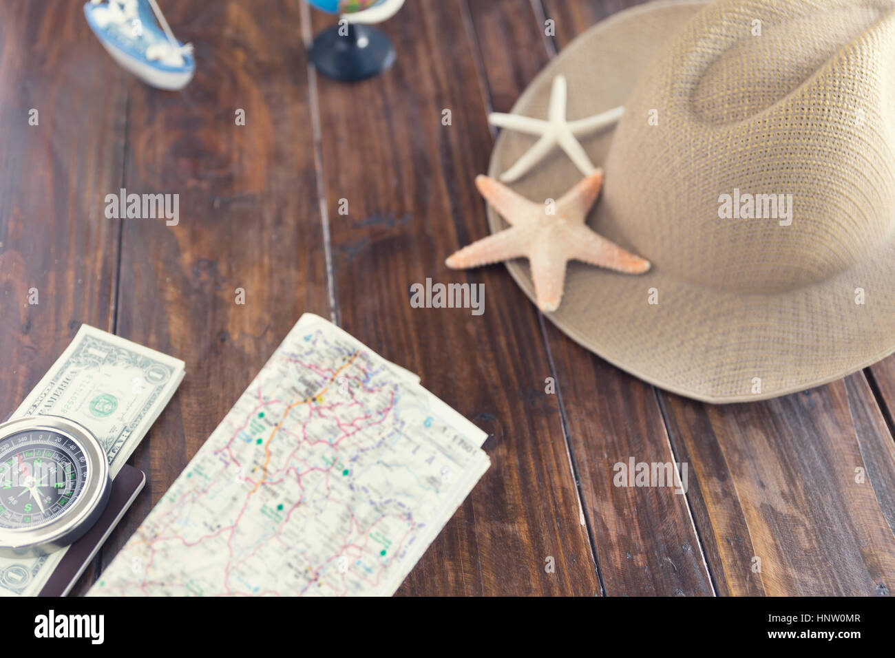 map, hat, compass, passport, banknote money, globe, ship and starfish ...