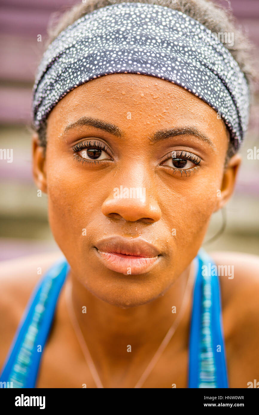 Serious Black woman sweating Stock Photo - Alamy