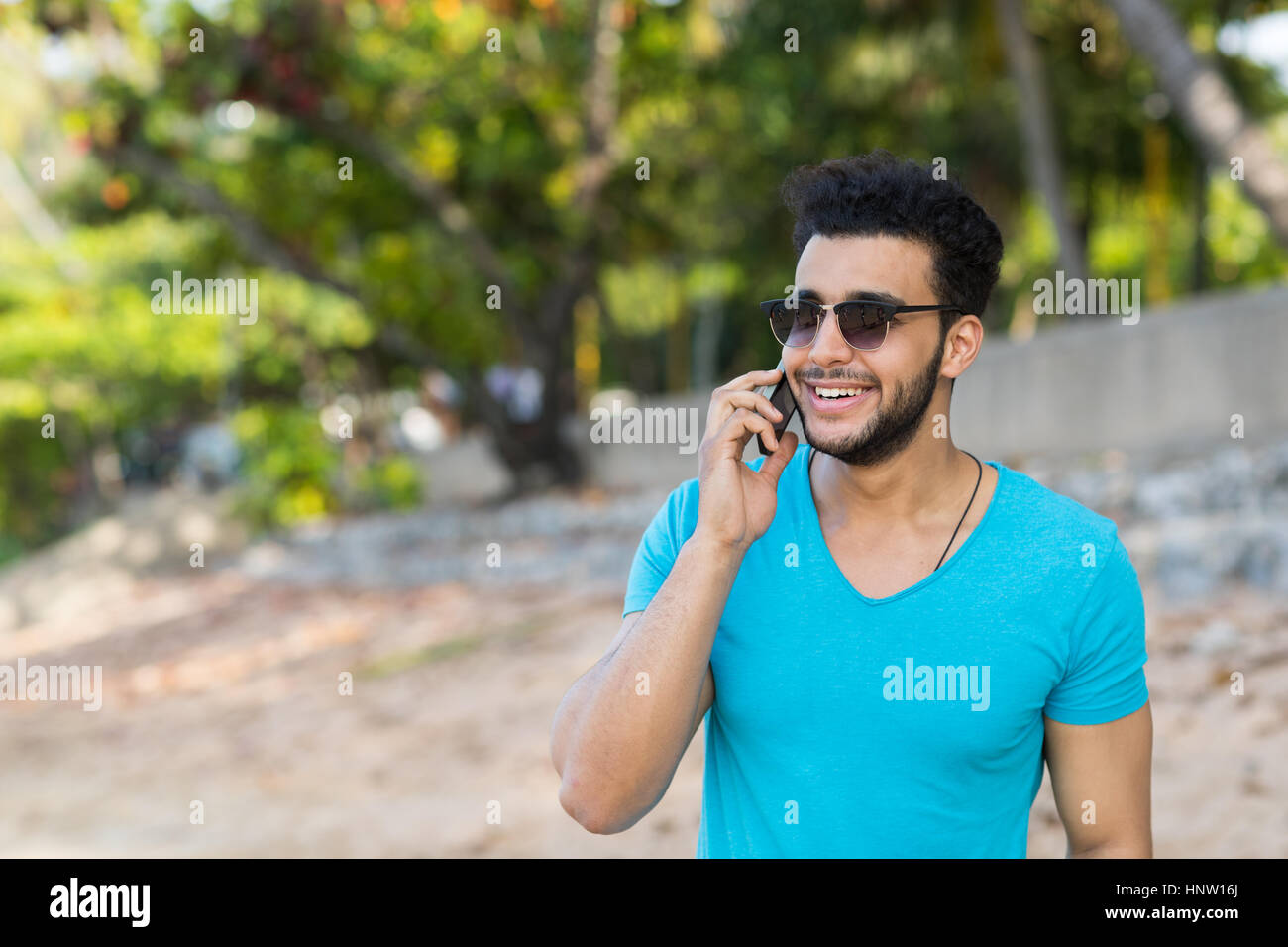 Young Hispanic Man Talking Phone Call Tropical Beach Sea Holiday Guy ...