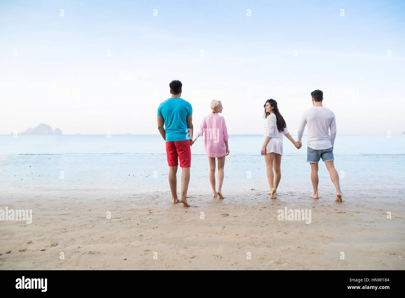 Female friends walking back view hi-res stock photography and images ...