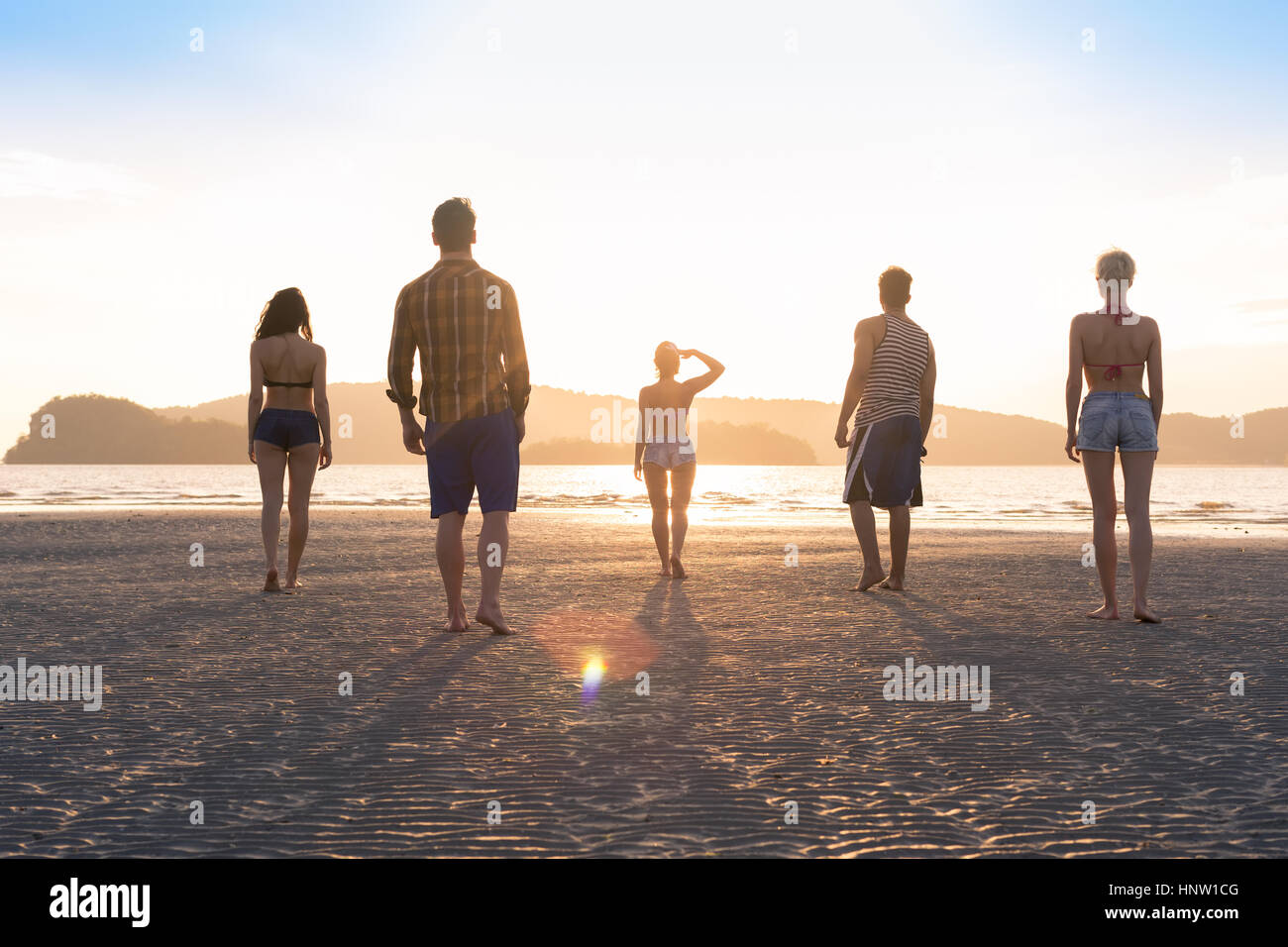 Female friends walking back view hi-res stock photography and images ...