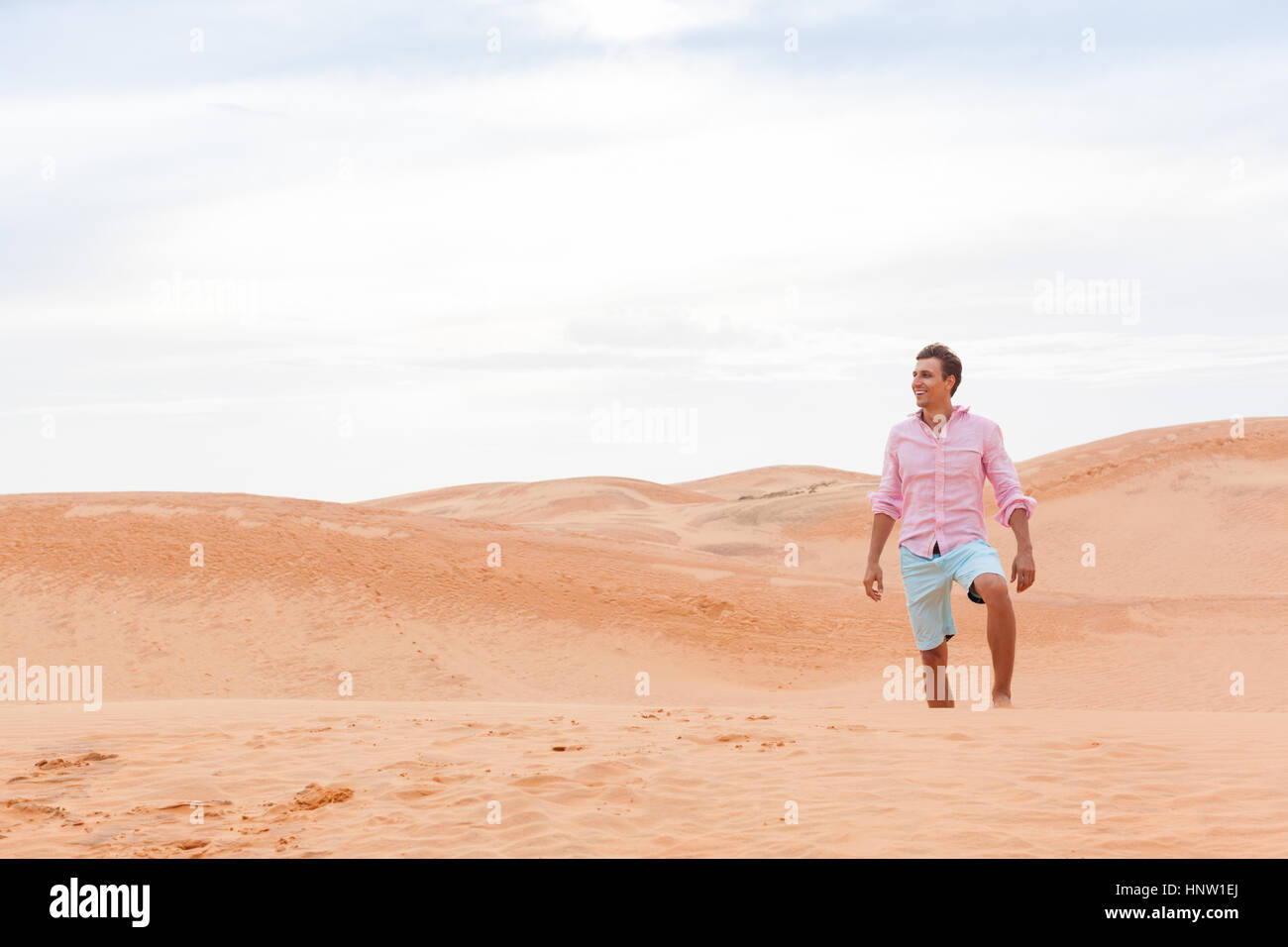 Handsome Man In Desert Young Guy Sand Dune Landscape Stock Photo - Alamy