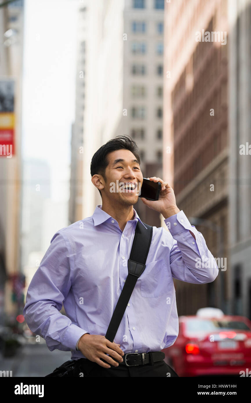 Chinese man talking hi-res stock photography and images - Alamy