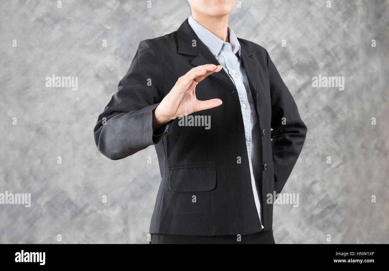 gesture of businesswoman hand holding something for use as business ...