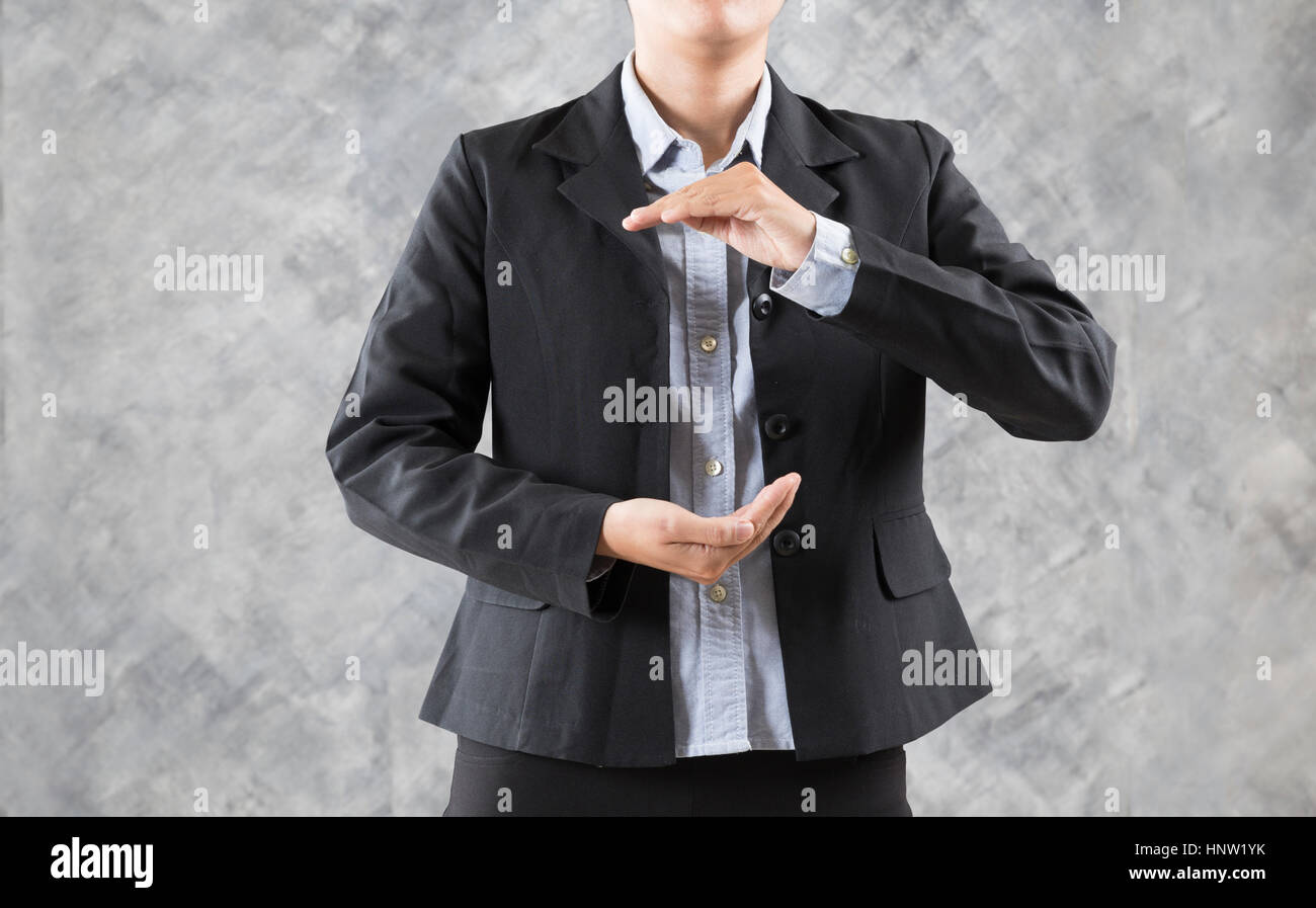 gesture of businesswoman hand holding something for use as business ...