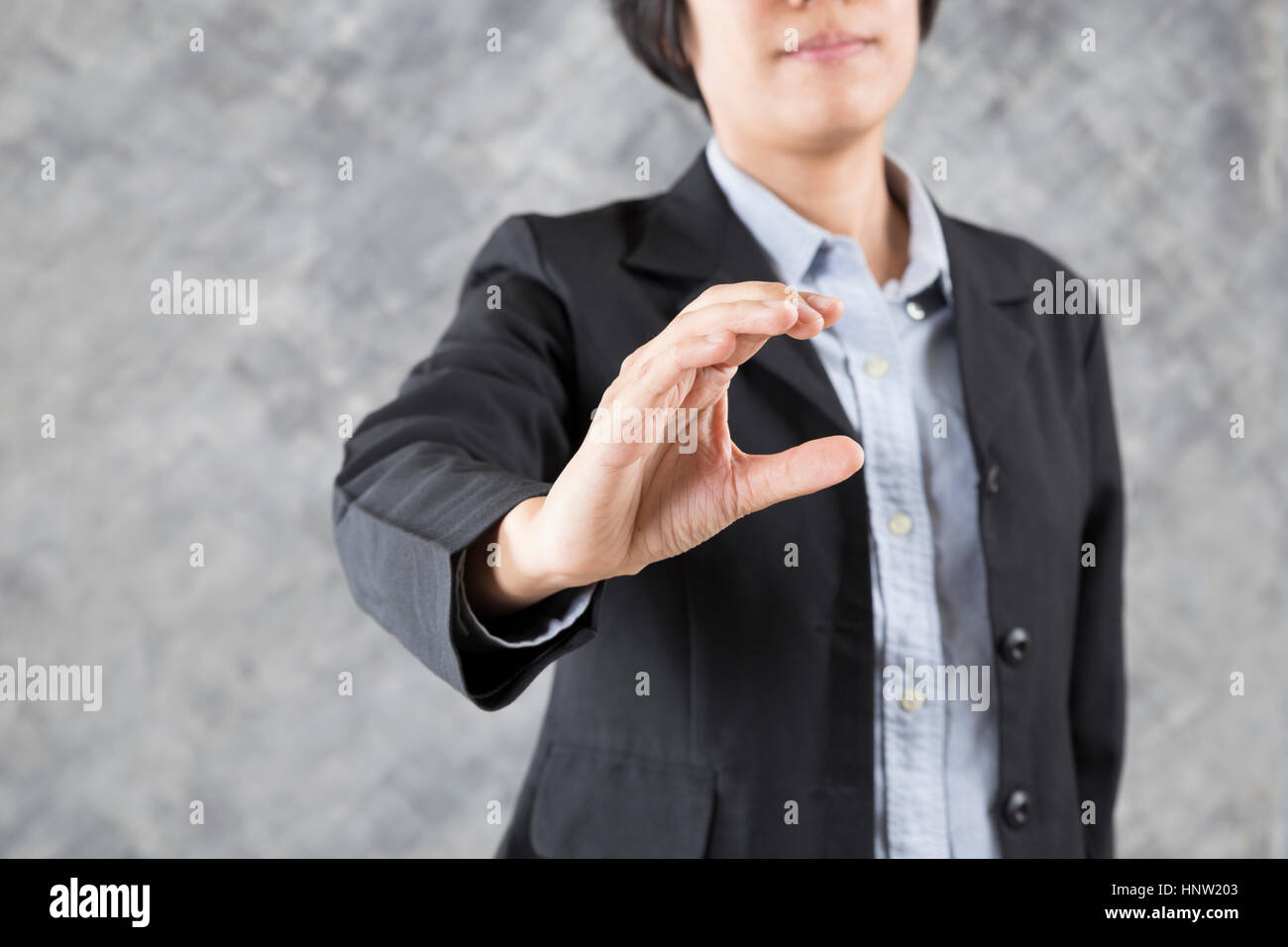 gesture of businesswoman hand holding something for use as business ...