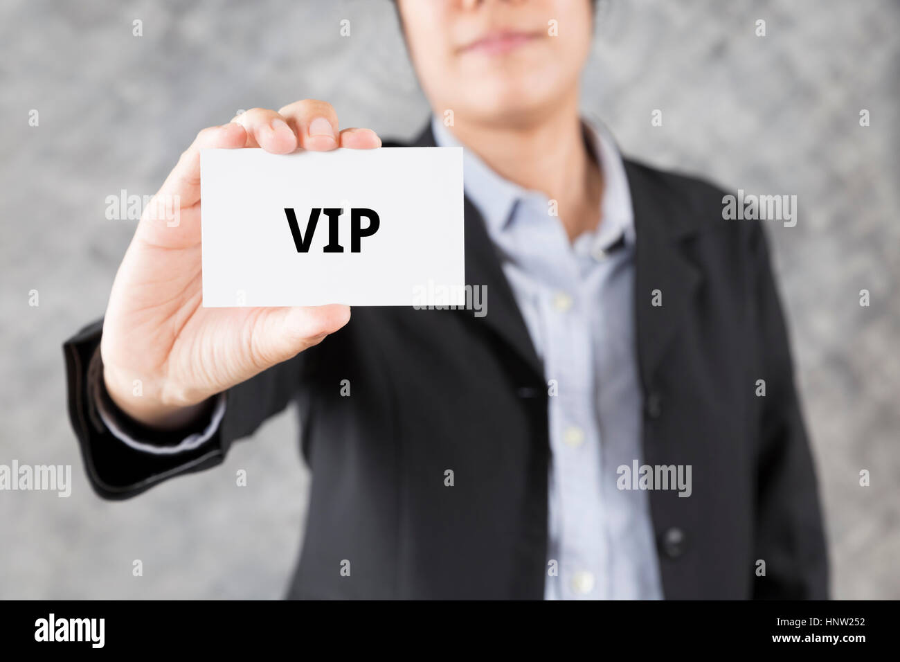 businessman showing business card with word VIP Stock Photo - Alamy