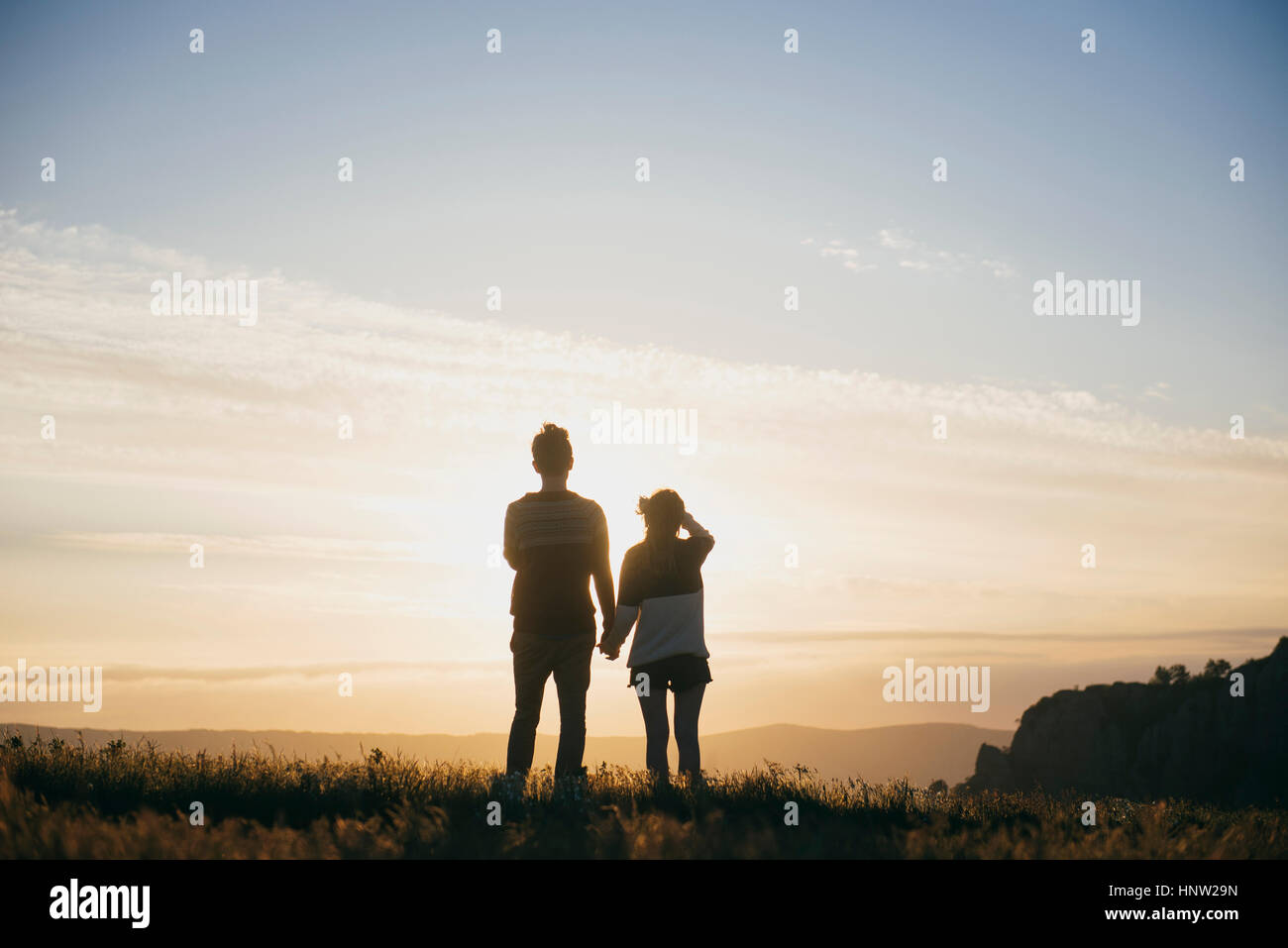 Two women back view silhouette hi-res stock photography and images - Alamy