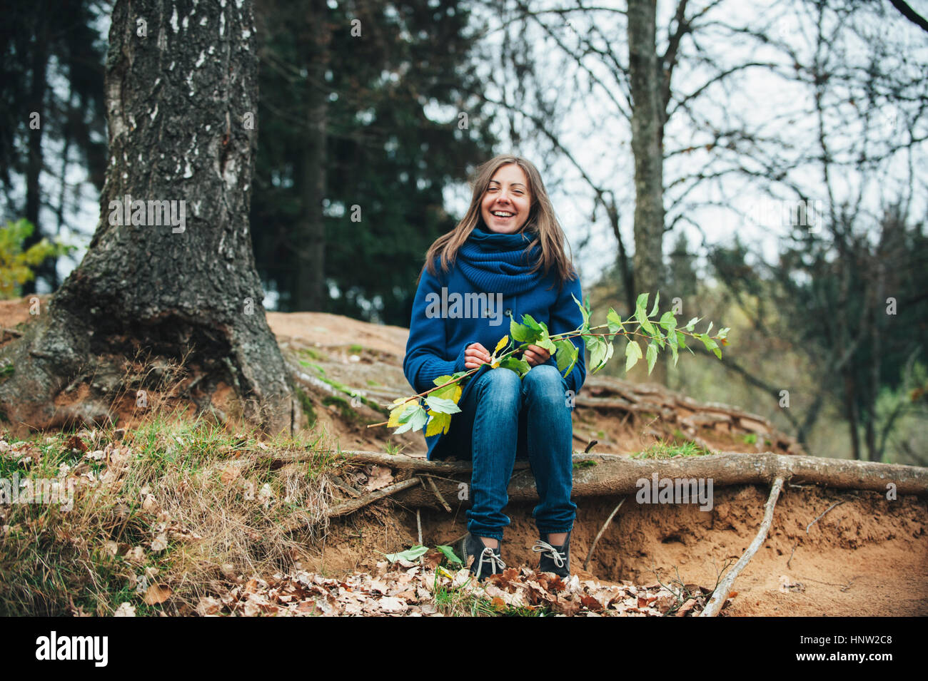 Woman tree branch hi-res stock photography and images - Alamy