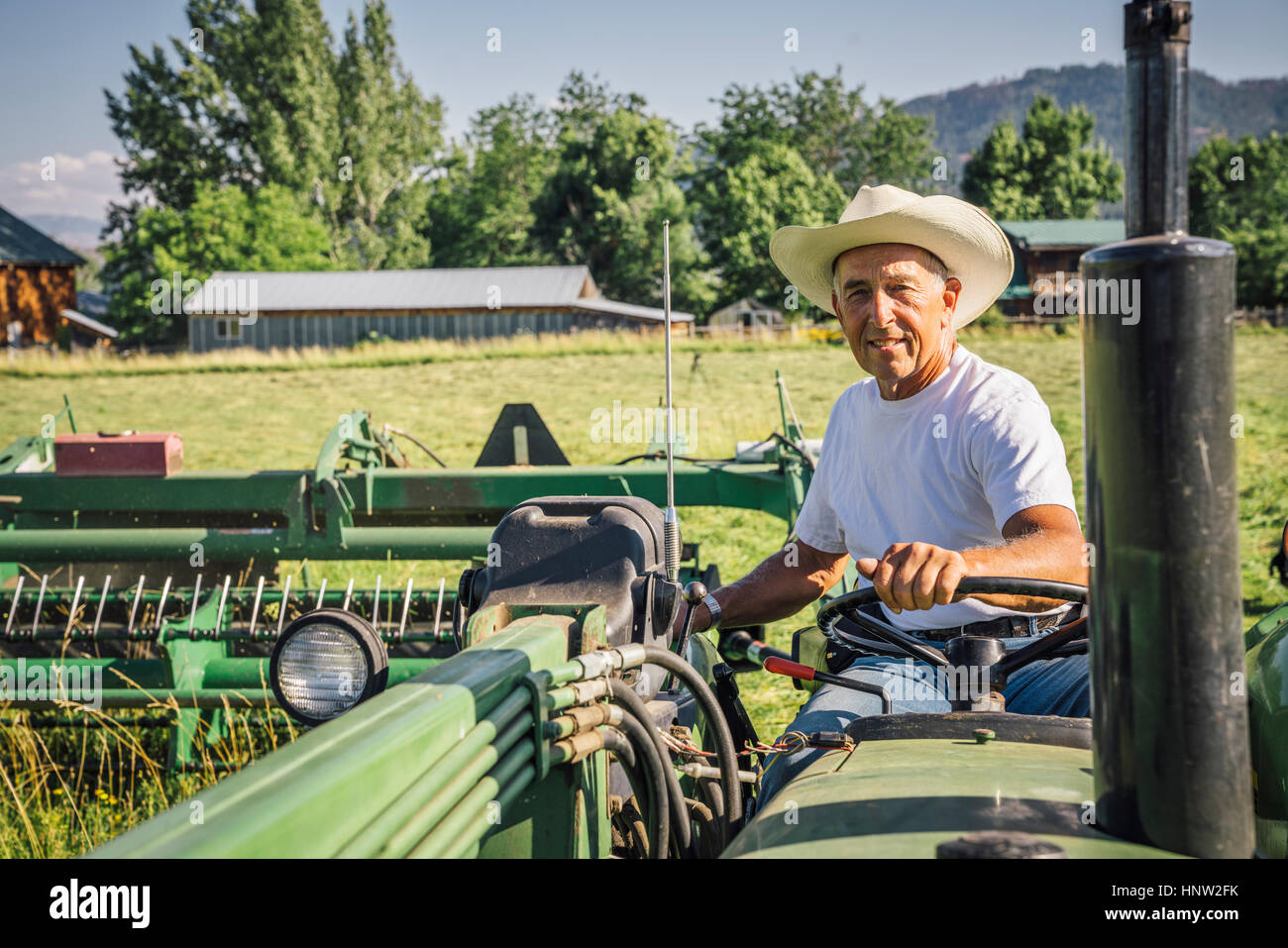 Farmer posing with tractor hi-res stock photography and images - Alamy