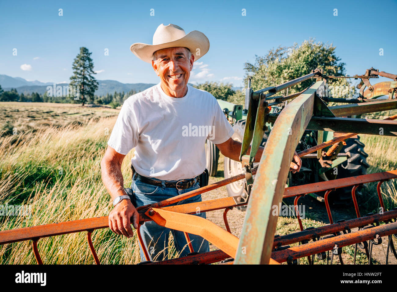 Farmer Posing With Tractor High Resolution Stock Photography and Images ...