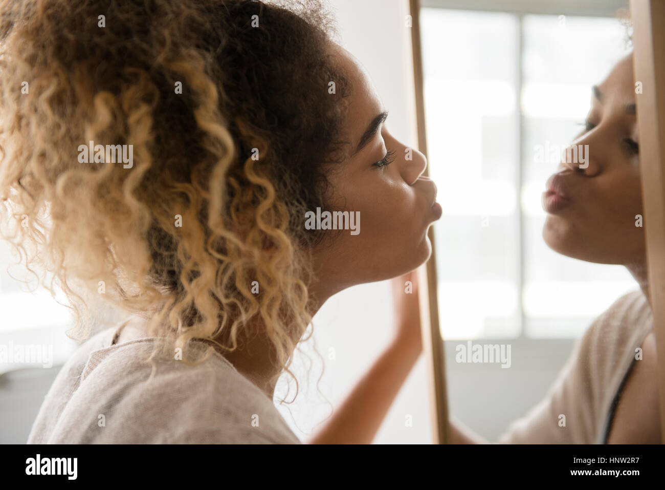 Woman puckering lips brunette hi-res stock photography and images - Alamy